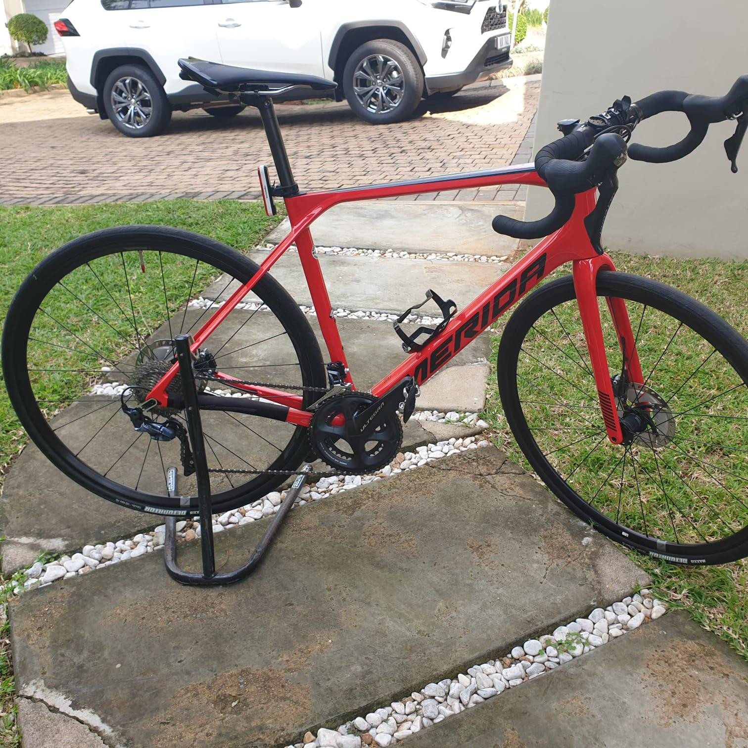 Carbon Road Bike - A Sweet, Glossy Race Red - Ride | Road Bikes | Bike Hub
