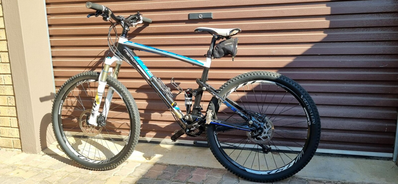 Merida Ninety Nine HFS XT | Dual Suspension Mountain Bikes | Bike Hub